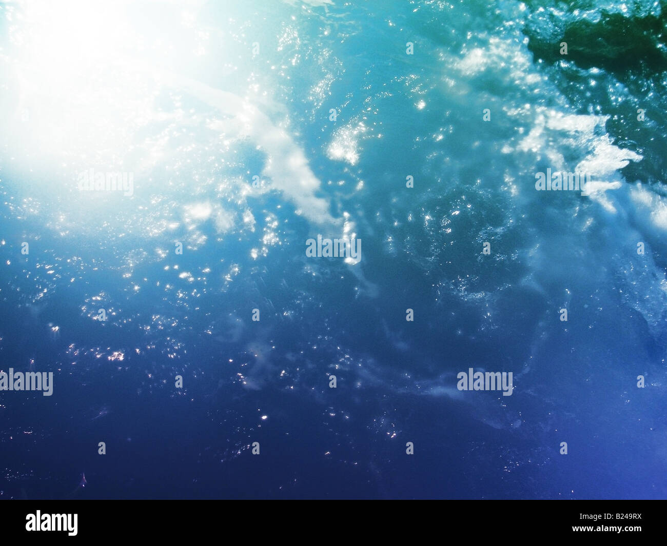 Sunlight through water Stock Photo - Alamy