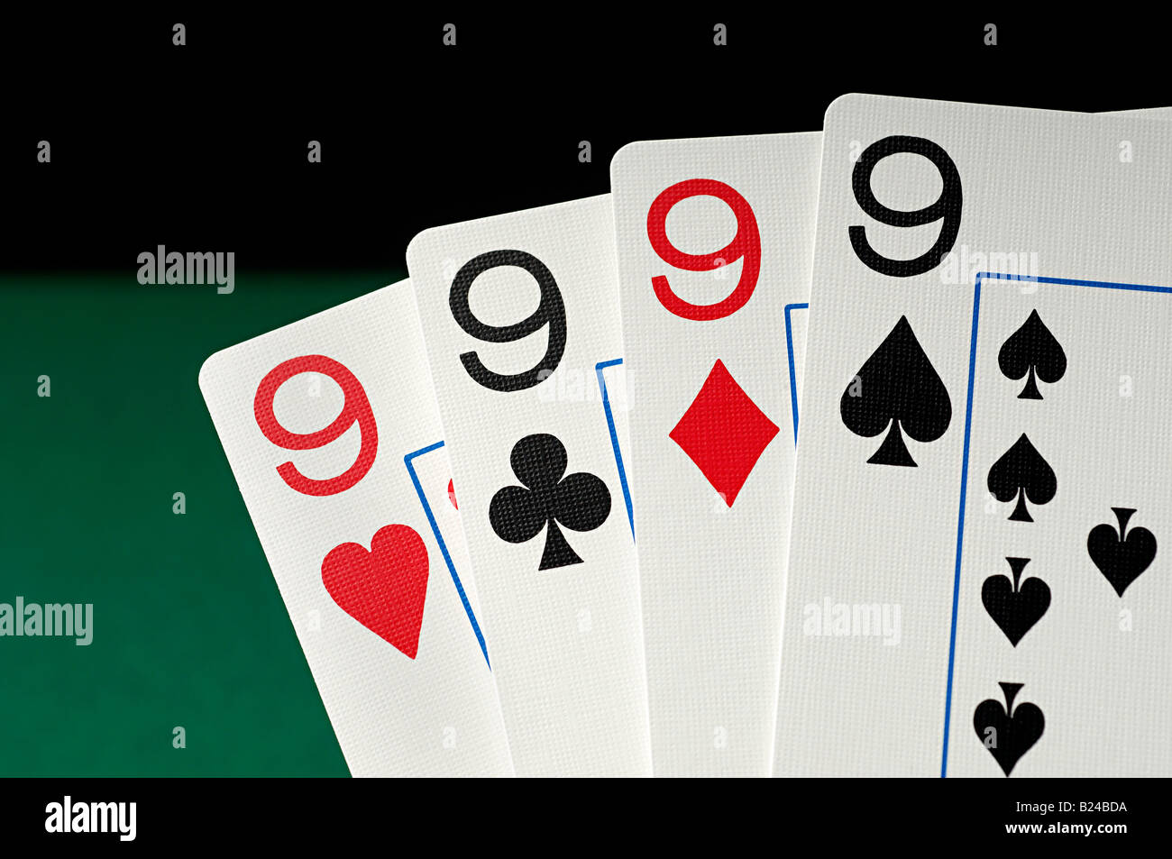 Four playing cards Stock Photo - Alamy