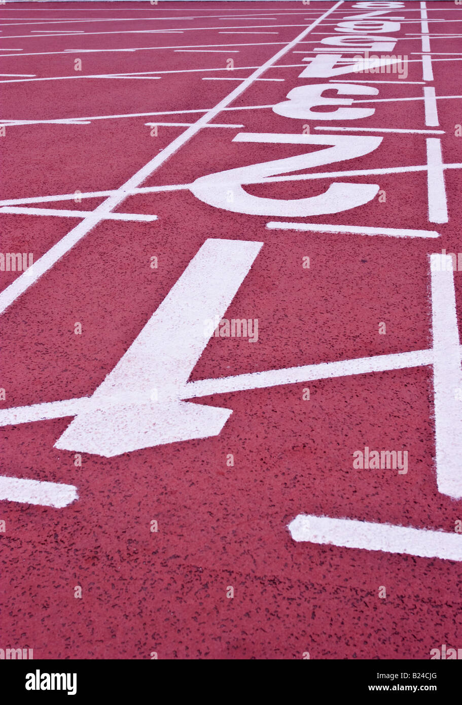 Lane numbers on an athletics running track Stock Photo - Alamy