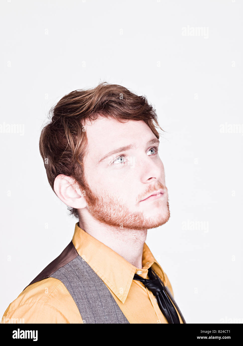 Young man looking up Stock Photo - Alamy