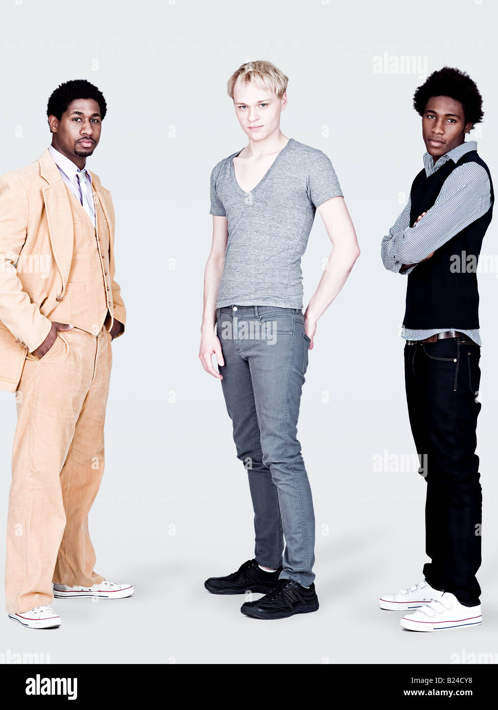 Stand three men hi-res stock photography and images - Alamy