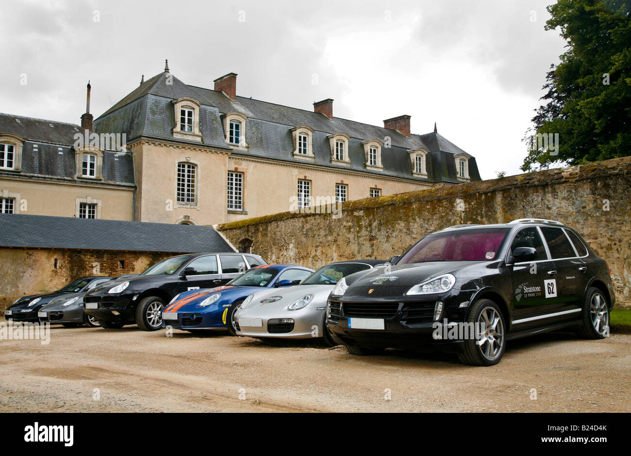 Porsche cars line up at the Chateau La Groirie country house in Trange ...