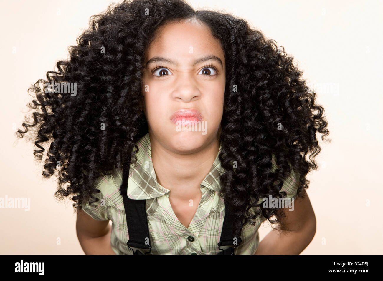 Portrait of an angry girl Stock Photo - Alamy