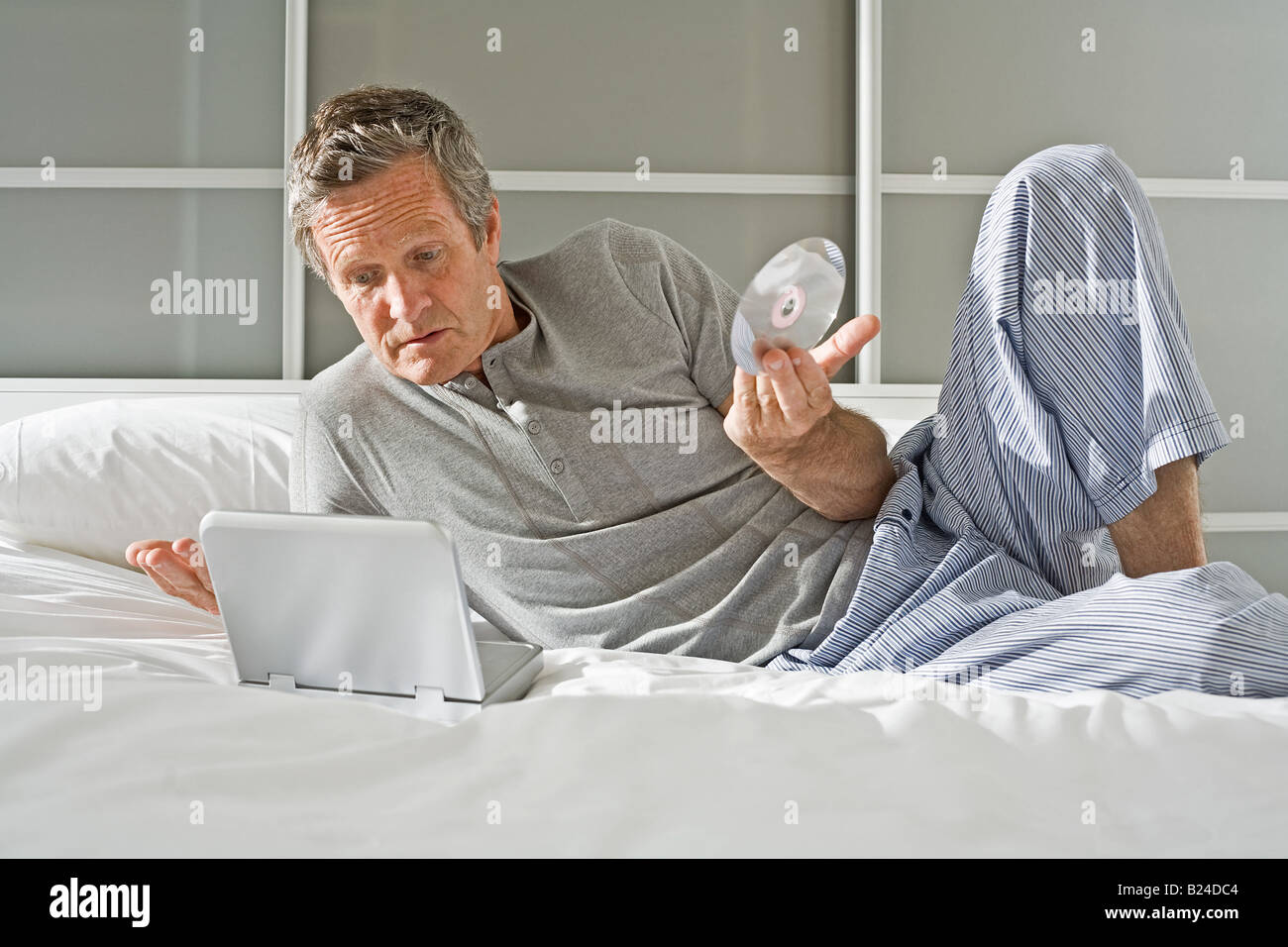 Dvd man male caucasian hi-res stock photography and images - Alamy