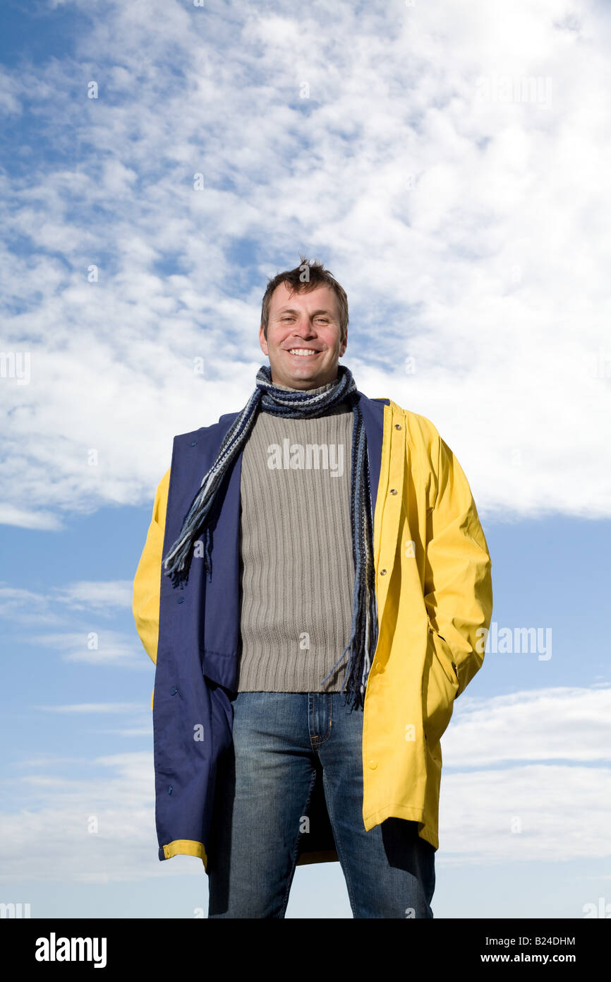 Man wearing raincoat hi-res stock photography and images - Alamy