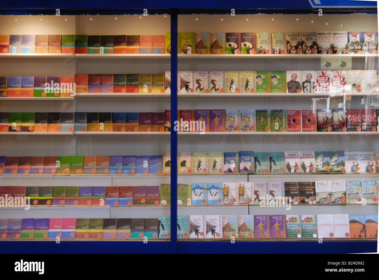 Rows of books on display in UK book shop window Stock Photo - Alamy