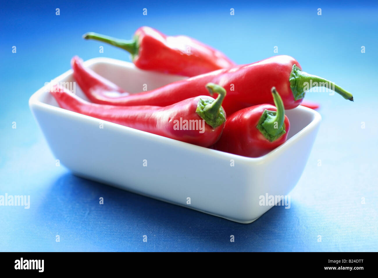 Red pepper object on a white background Stock Photo - Alamy