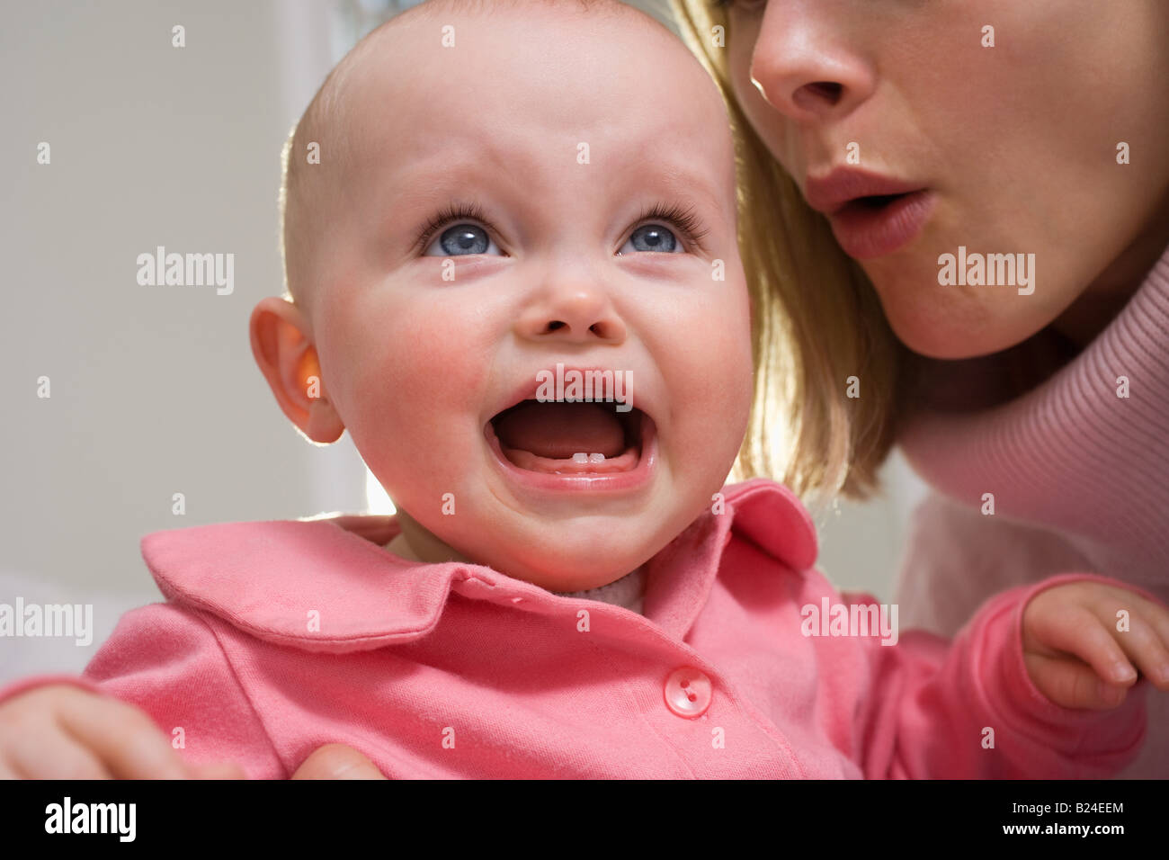 Mother and baby girl Stock Photo - Alamy