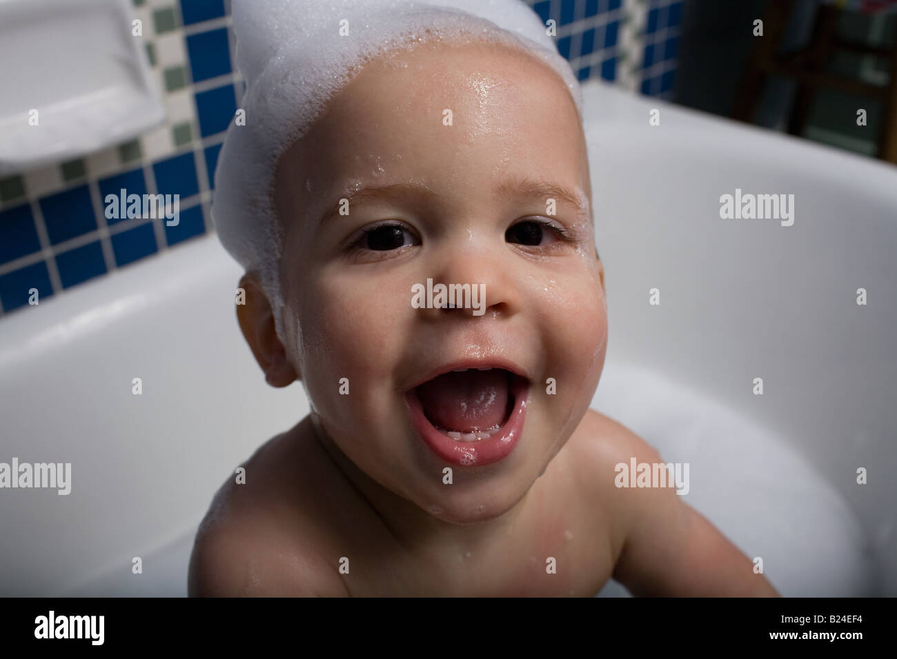 Boy Looking Up Bubble On High Resolution Stock Photography and Images ...