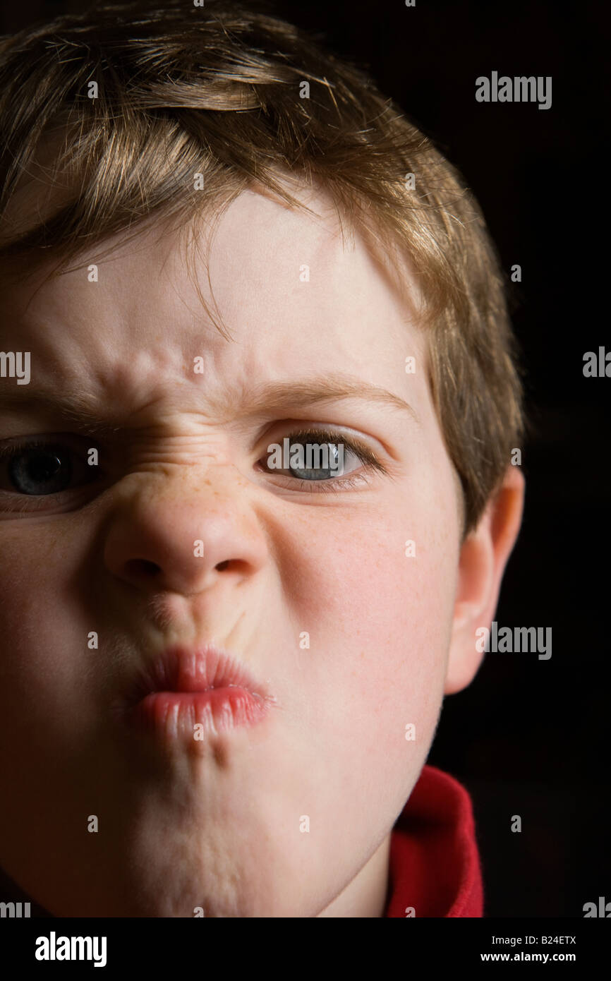 Boy making a face Stock Photo - Alamy