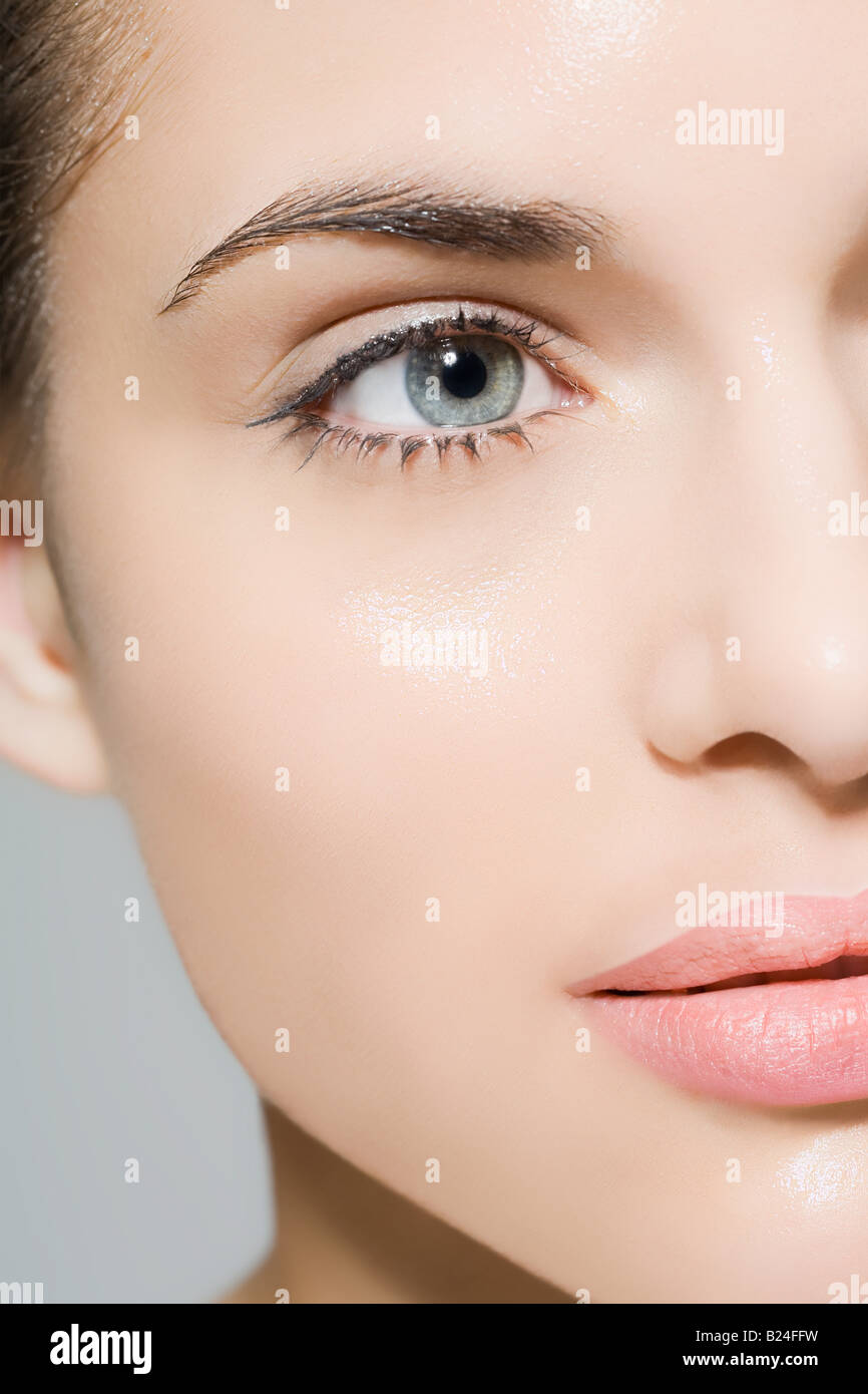 Woman with wet face Stock Photo - Alamy