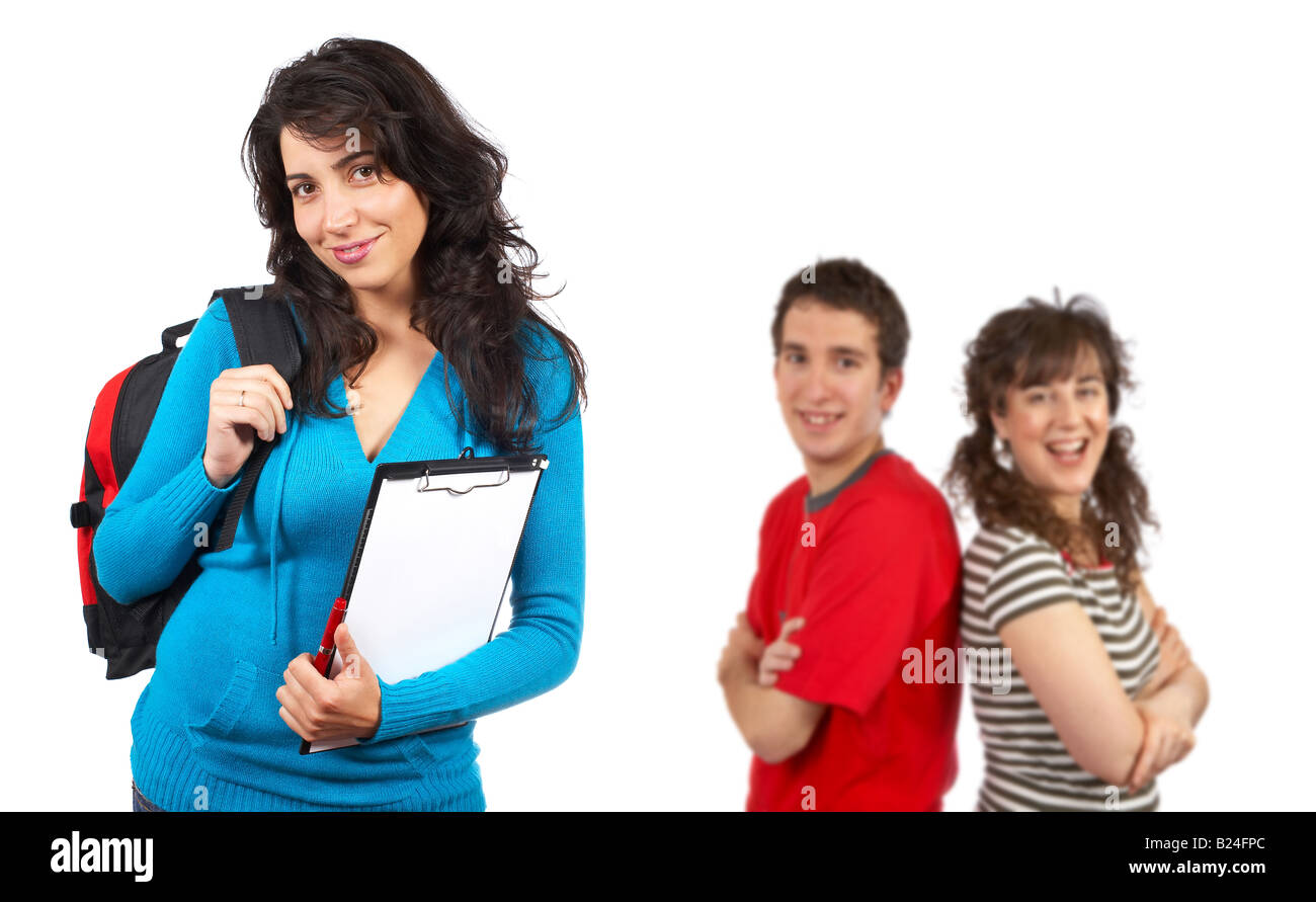 Three students with books and backpacks over a white background Focus ...