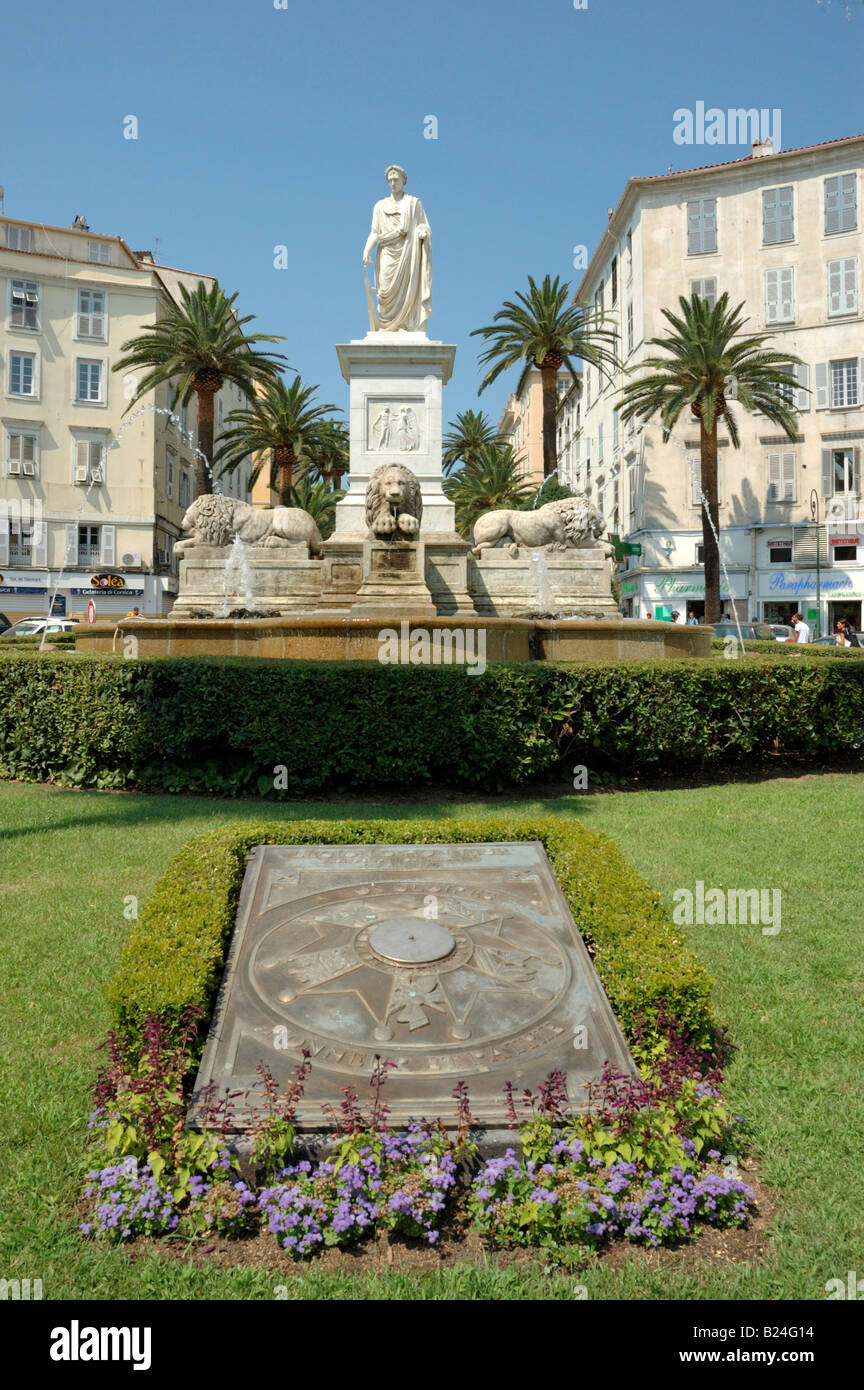 A white marble statue of Napoleon on Place Foch with ornamental lions ...