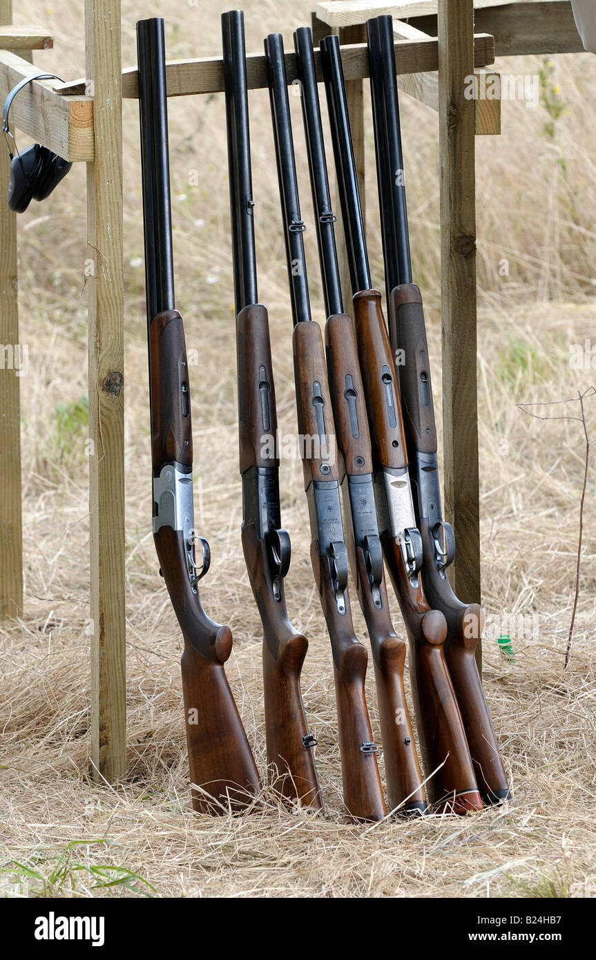 A row of russian shotguns at a sideshow Stock Photo - Alamy