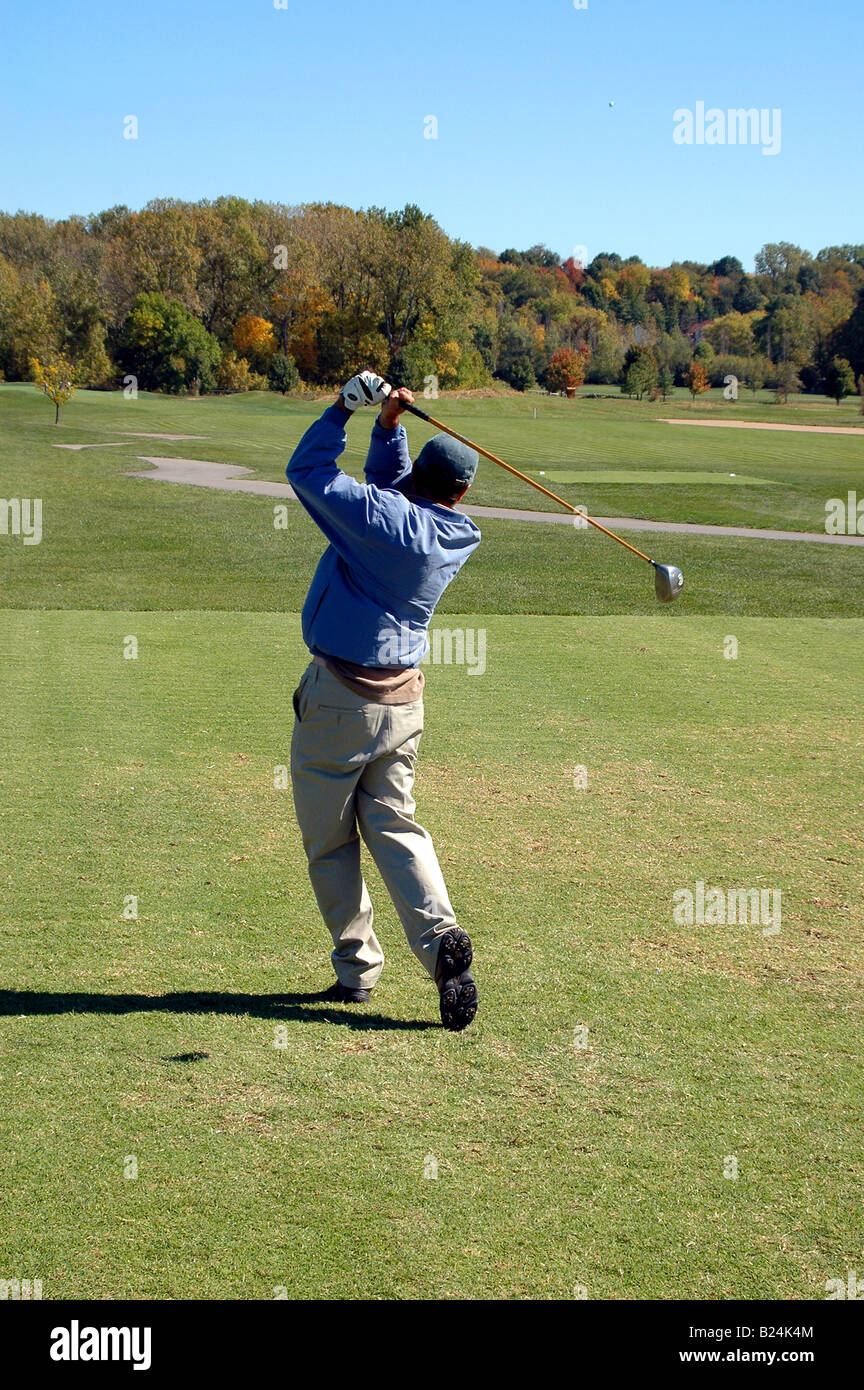 Beautiful gold swing on a pristine fall day Stock Photo - Alamy