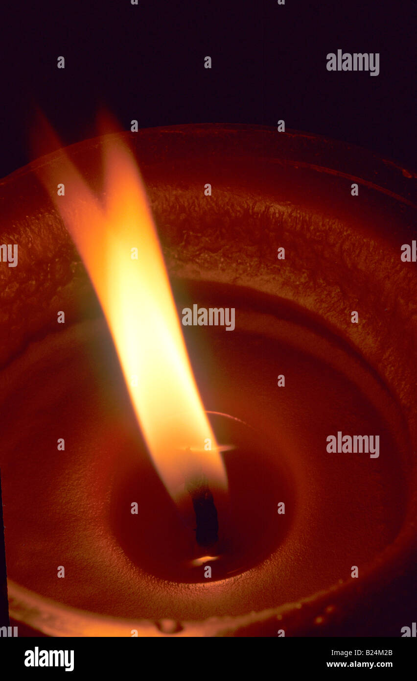 CLOSE UP BURNING CANDLE FLAME OF CANDLE Stock Photo - Alamy