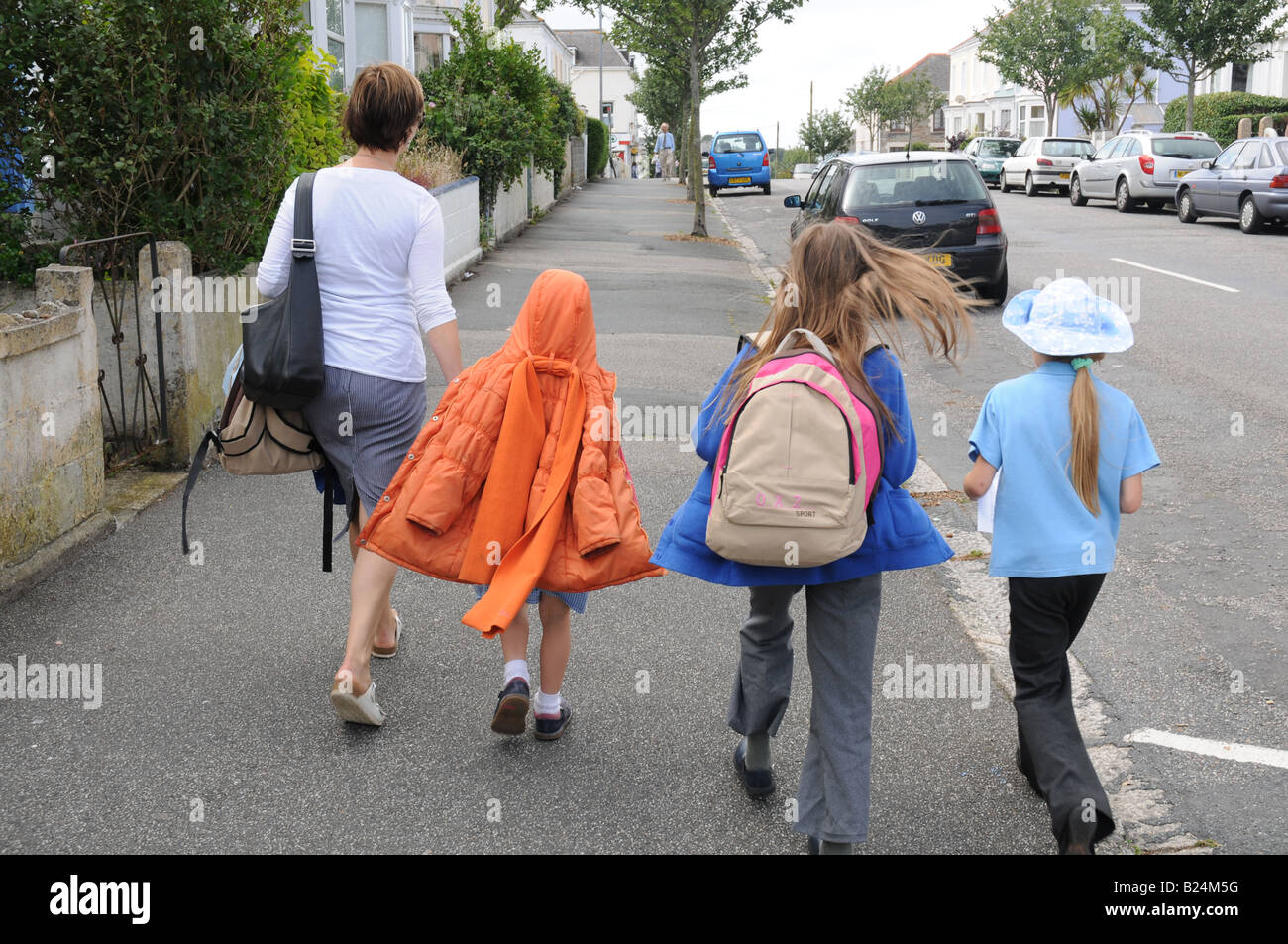 Children returning home from school in Falmouth, UK Stock Photo - Alamy