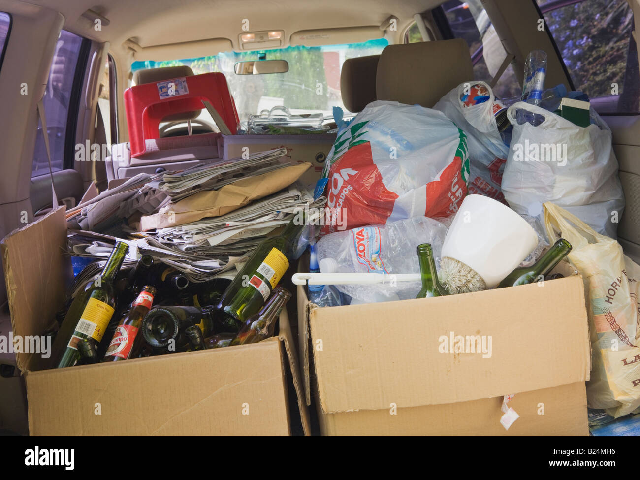 Household rubbish for recycling in back of van Stock Photo - Alamy