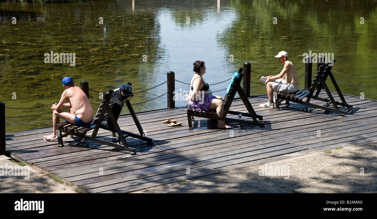 sunbathing in park Stock Photo - Alamy