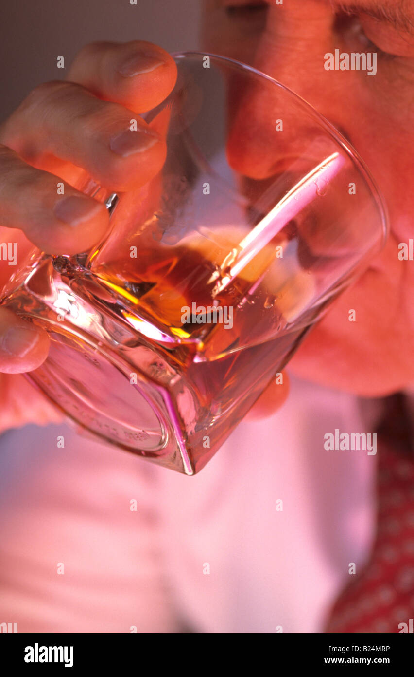 MAN DRINKING LIQUOR ALCOHOL CONSUMPTION Stock Photo - Alamy