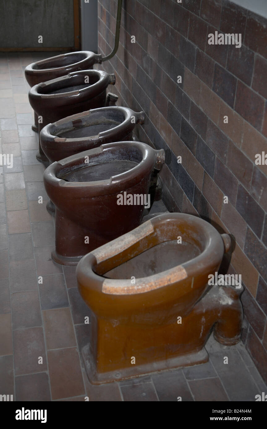 line of communal toilets in the residential prisoner barracks at dachau ...
