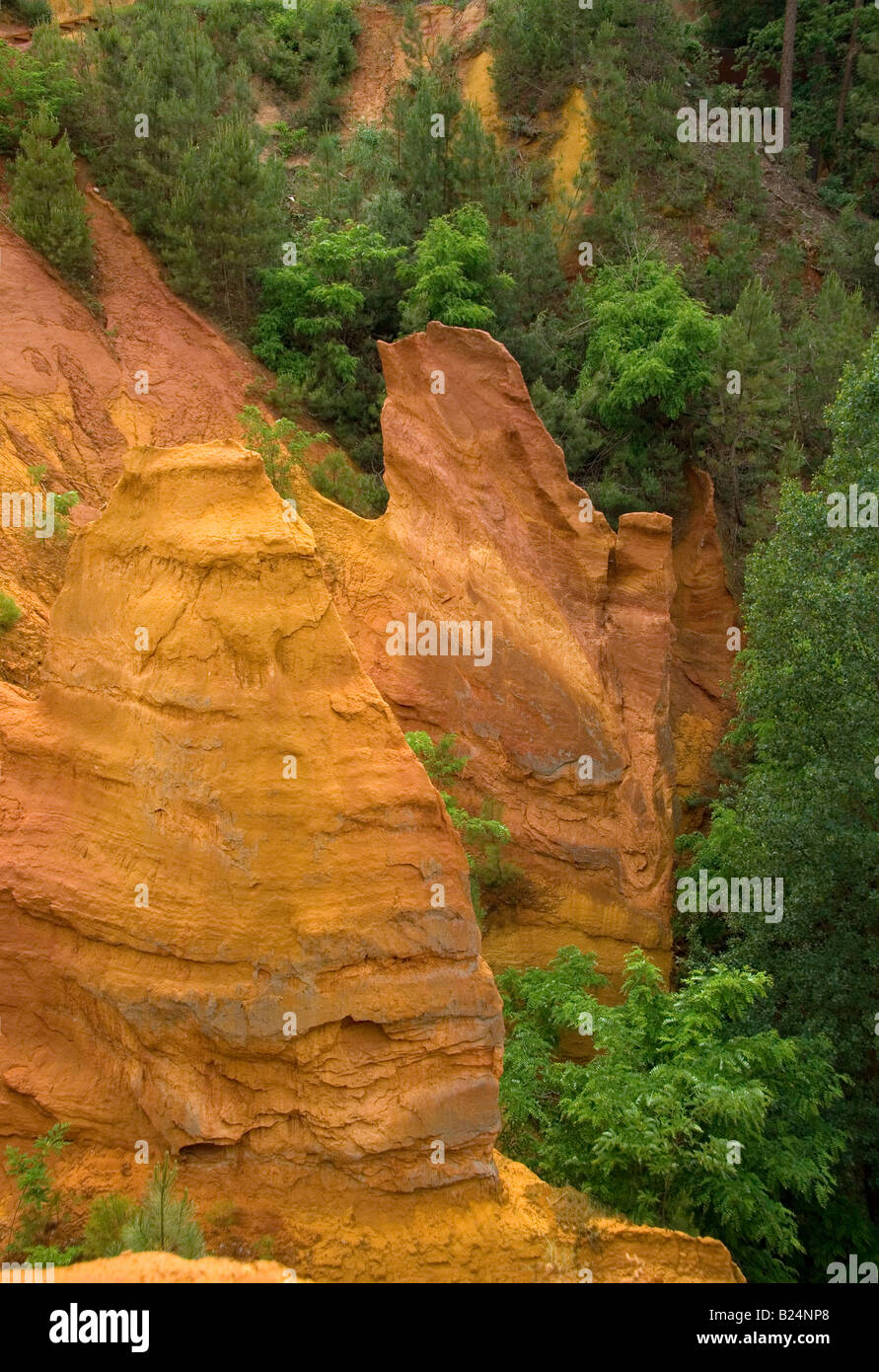 Ochre cliffs at Roussillon in the Luberon area of France, where raw ...