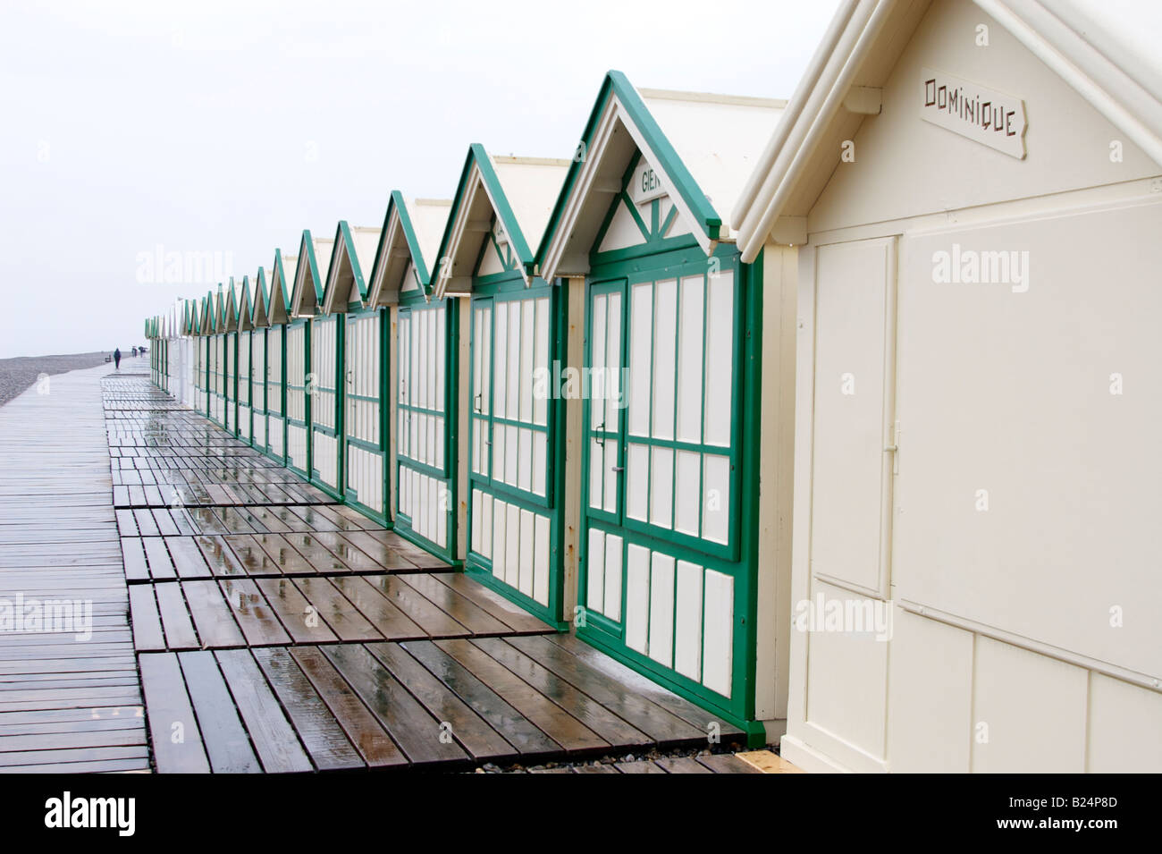 Beach huts for getting changed in the rain facing the sea near St ...