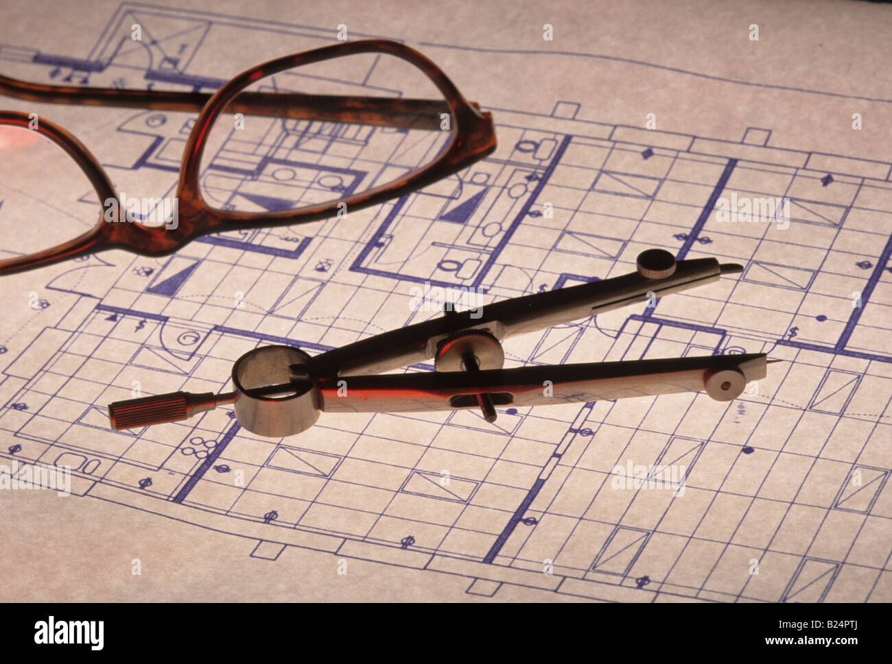 BLUEPRINT AND COMPASS AND GLASSES STILL LIFE Stock Photo - Alamy