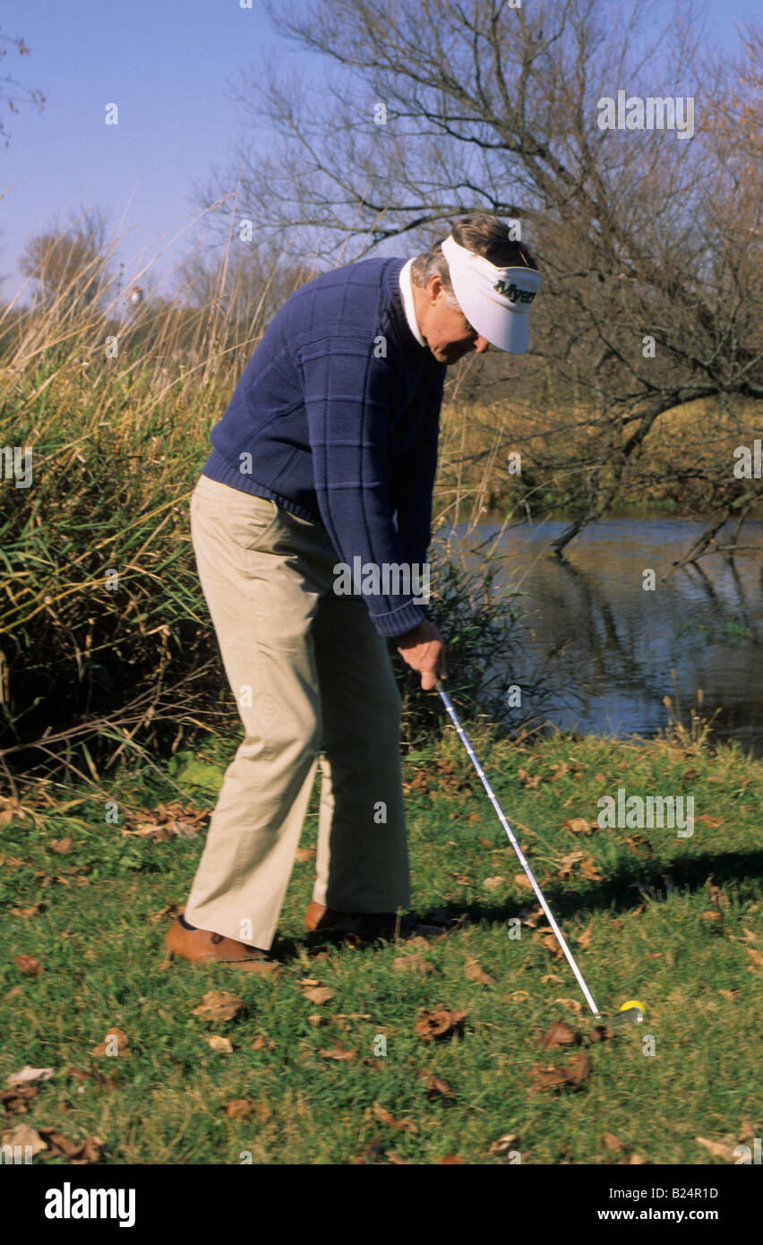 SENIOR MAN PLAYING GOLF Stock Photo - Alamy