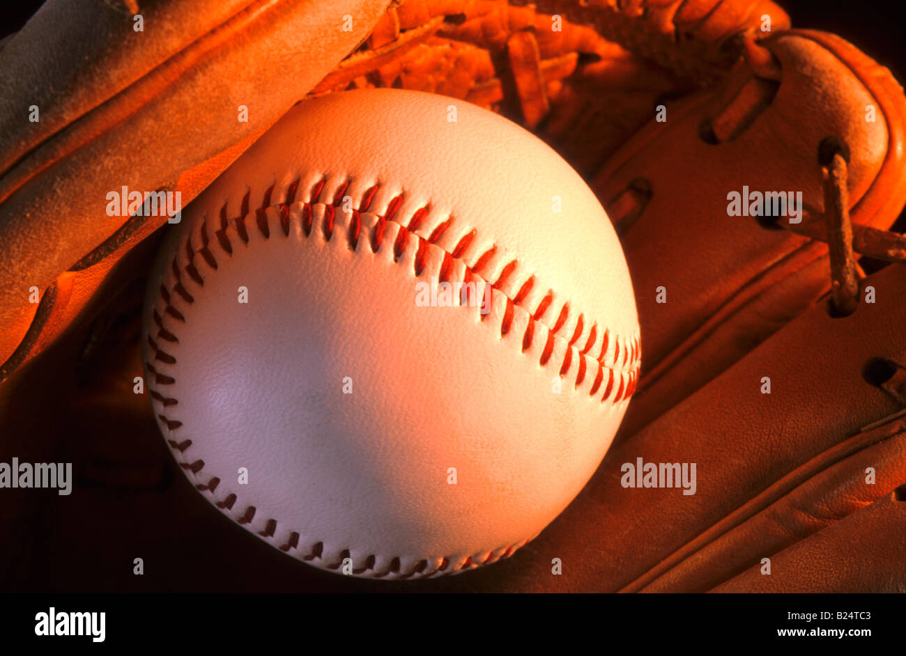 STILL LIFE BASEBALL IN BASEBALL MITT Stock Photo - Alamy