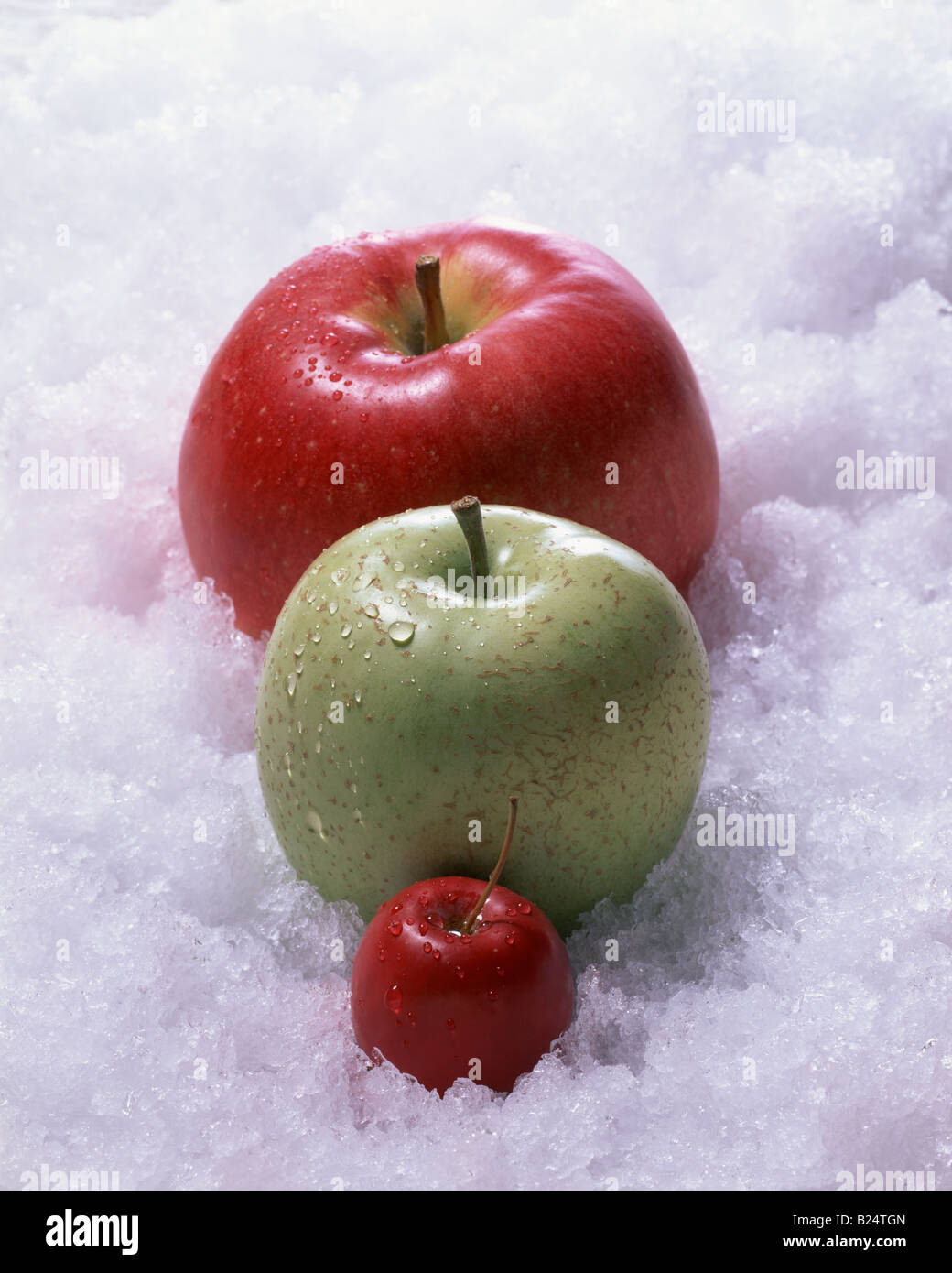 Apples on Ice Stock Photo - Alamy