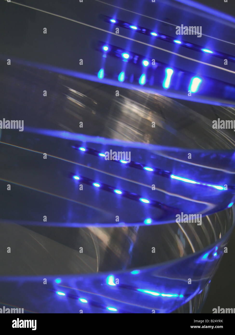 blue laser rays on round cylinder wheel glass Stock Photo - Alamy