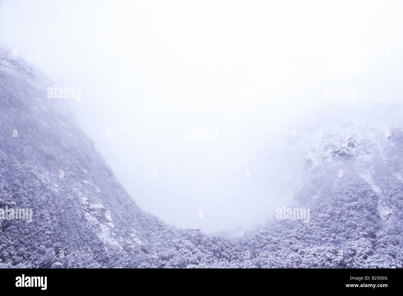 Snow covered mountains dominate along the scenic Milford Road (State ...