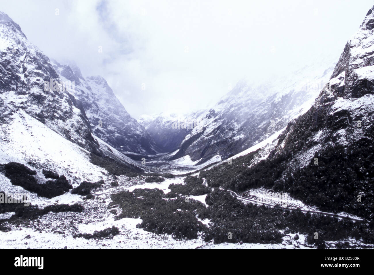 Snow covered mountains dominate along the scenic Milford Road (State ...
