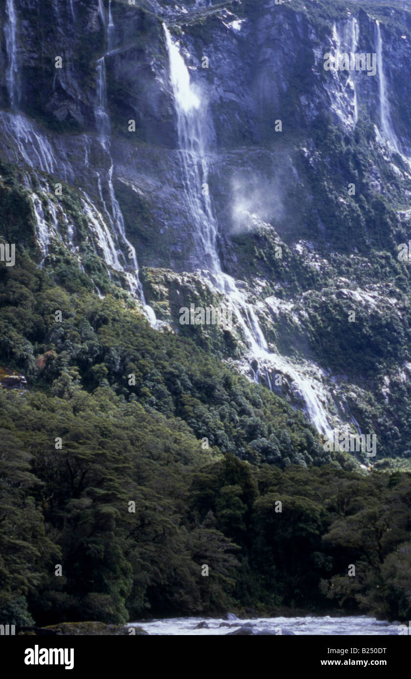 Temporary waterfalls after heavy rain drain the sheer slopes of the ...