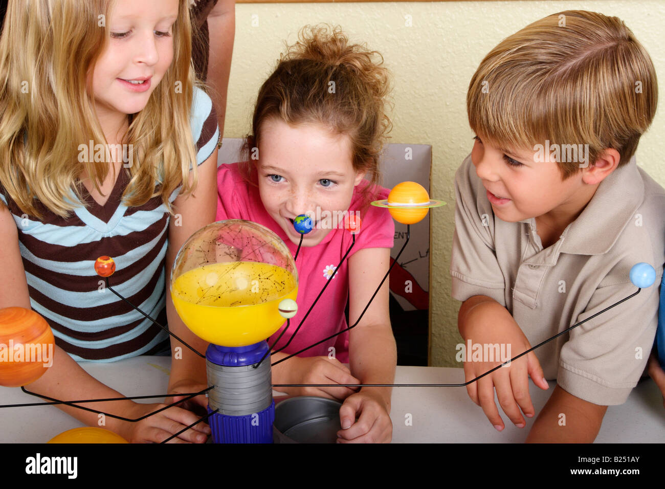 Young students learning about the Solar System Stock Photo - Alamy