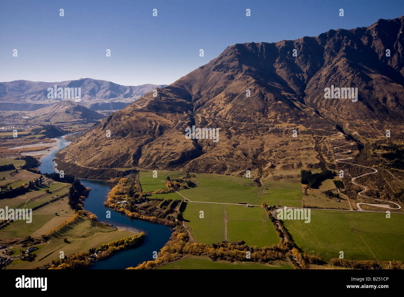 High altitude view of mountains with river The Remarkables, and Kawarau ...