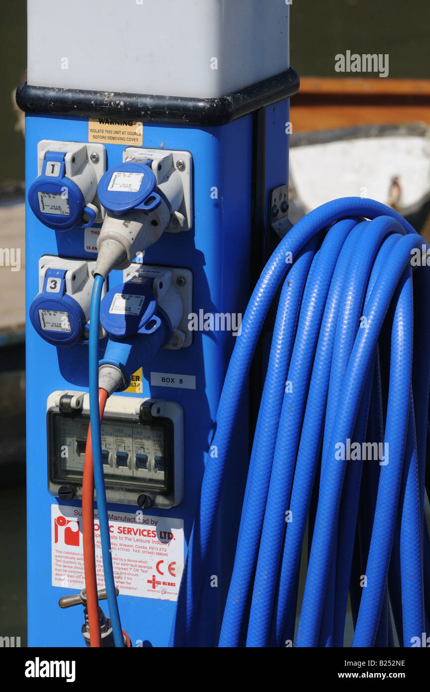 electrical and water supply unit at Marina Stock Photo - Alamy