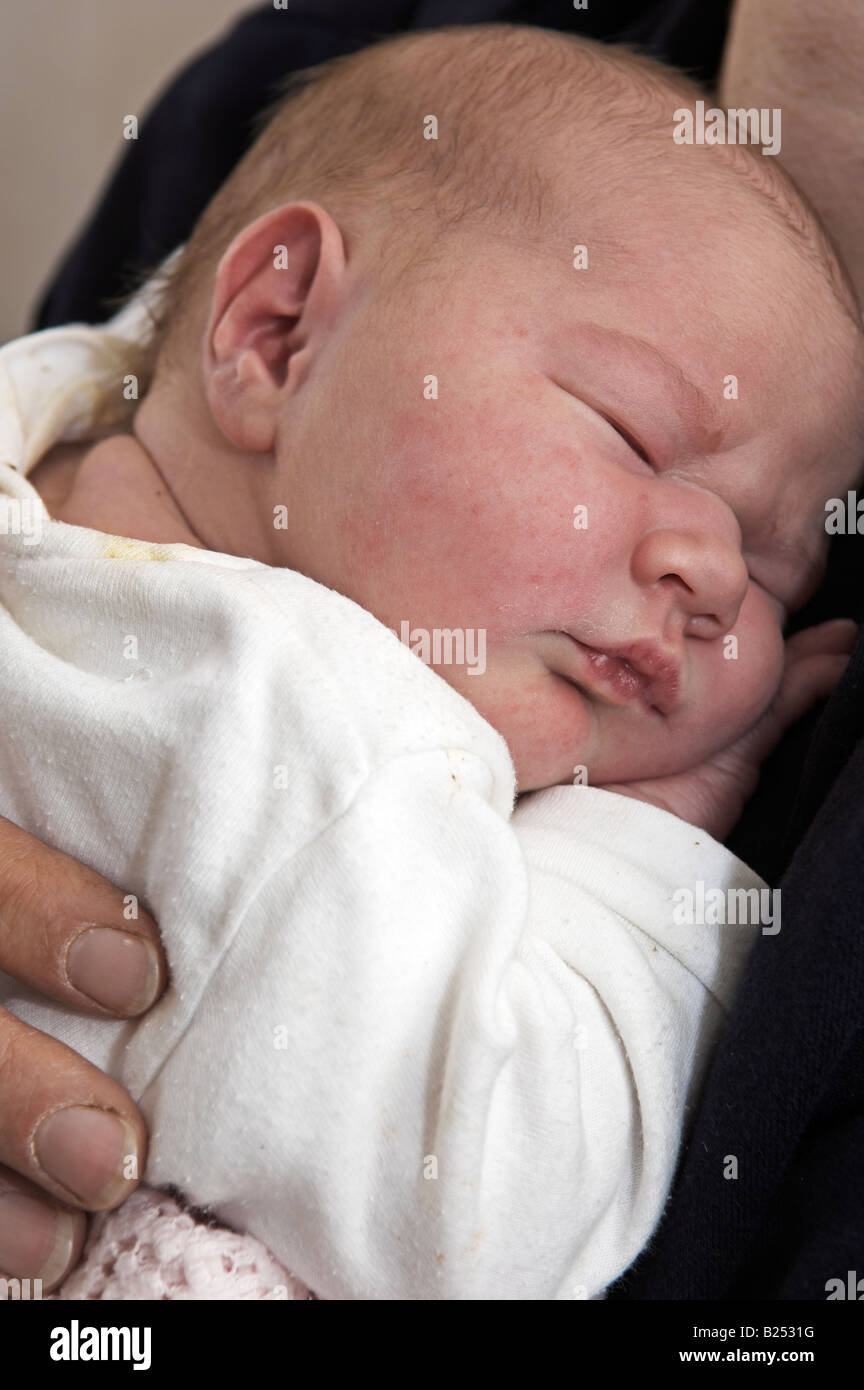 Newborn baby being held up hi-res stock photography and images - Alamy