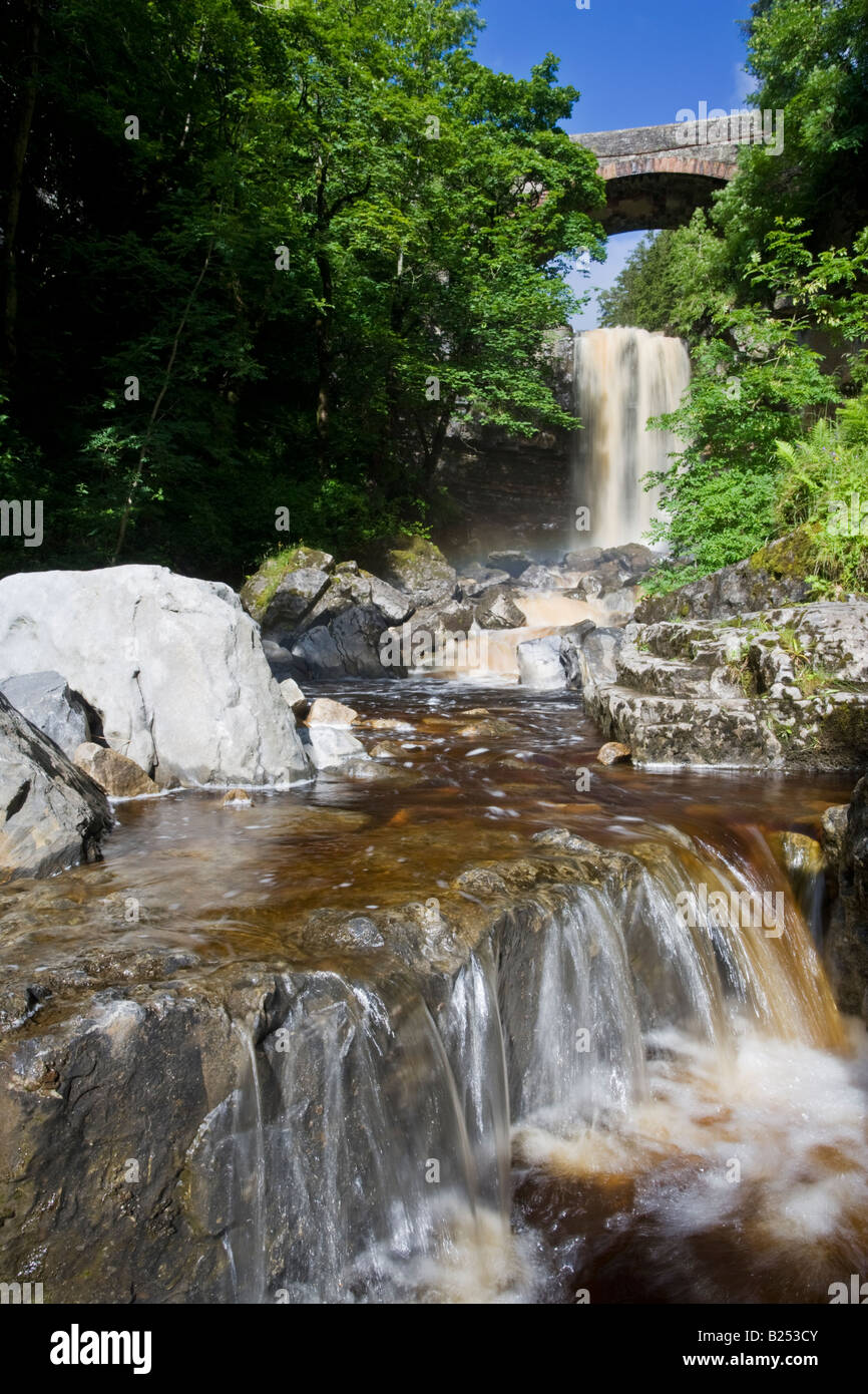 The peaty water of Ashgill Waterfall near Garrigill in Cumbria, England ...