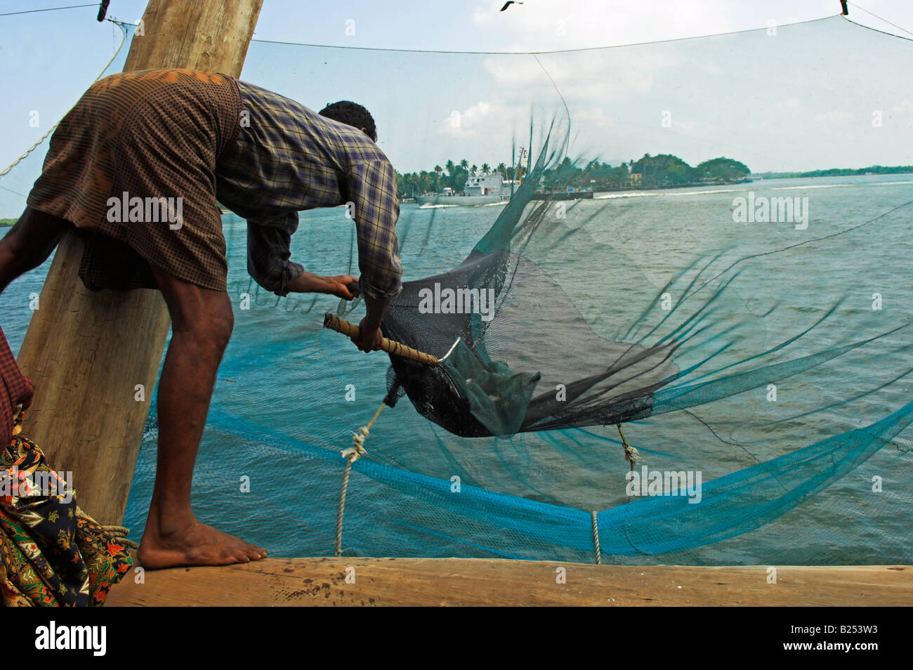 Bringing fish catch in from "Chinese nets" at Cochin Kerala India Stock Photo - Alamy