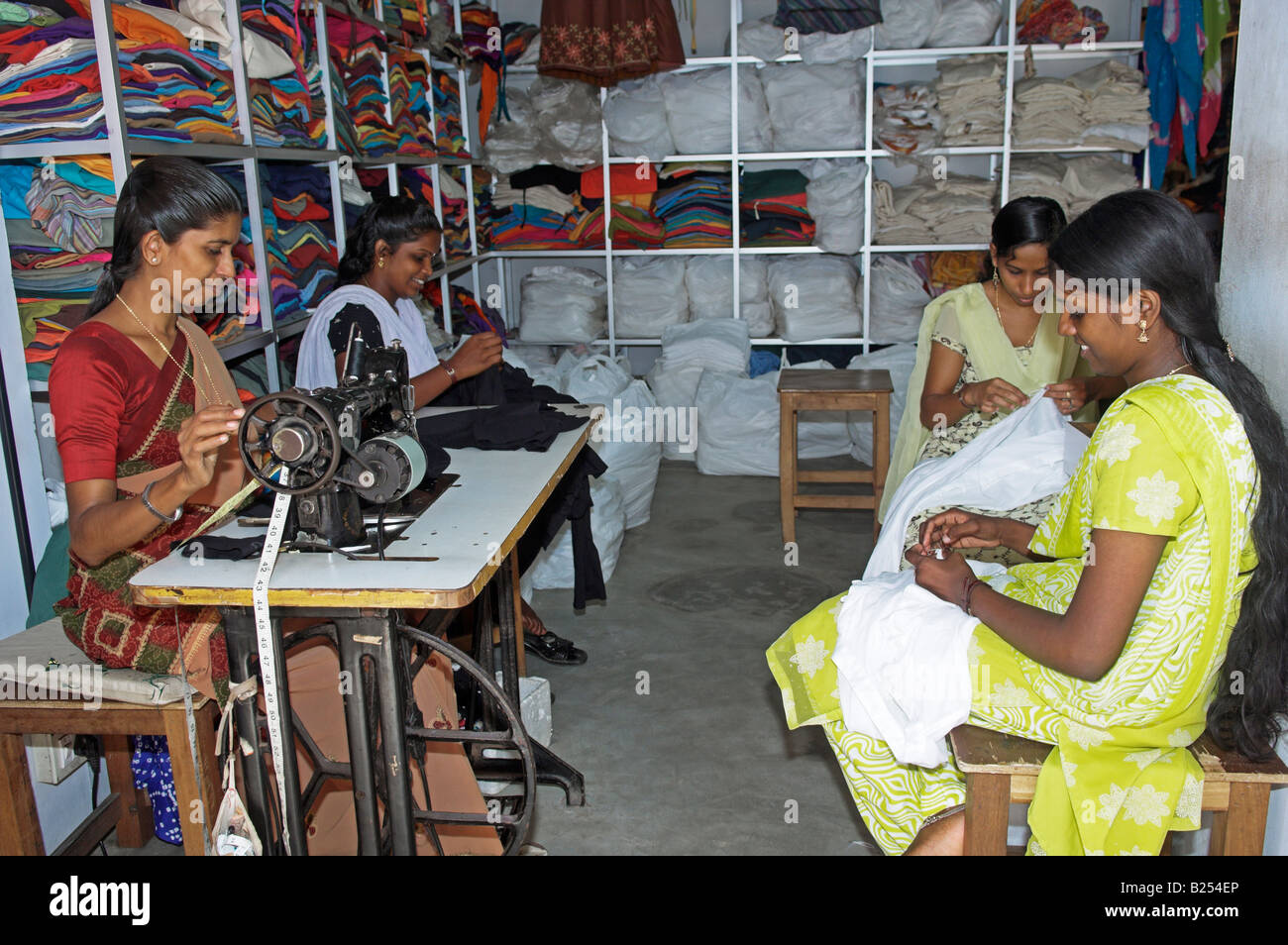 Indian woman sewing machine hi-res stock photography and images - Alamy