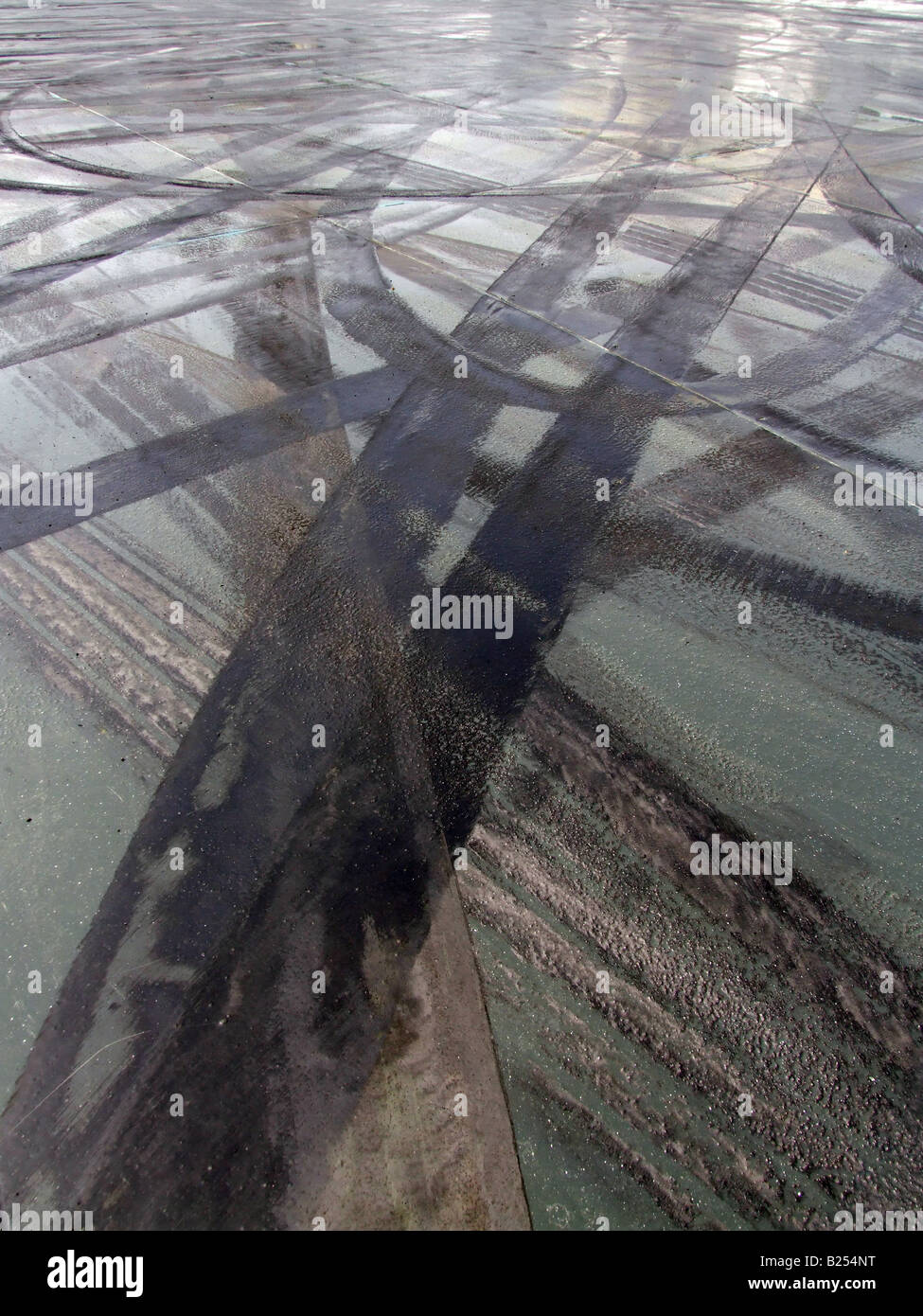 sports car skid marks on race track outdoors Stock Photo - Alamy
