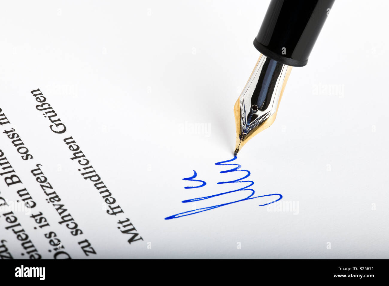 Signing a letter with a fountain pen Stock Photo - Alamy
