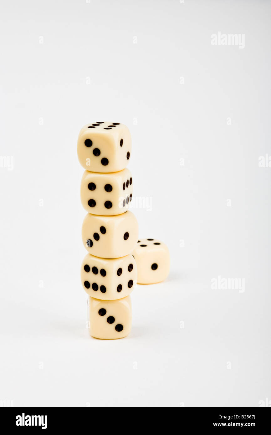 Rolling dice on white background Stock Photo - Alamy