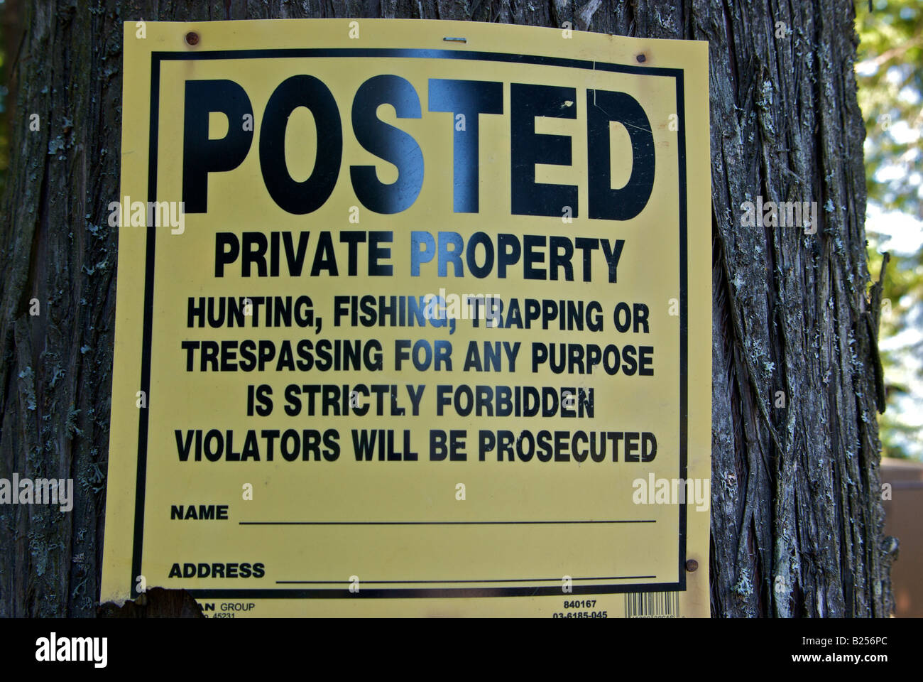 Posted private property no trespassing sign on tree Stock Photo - Alamy