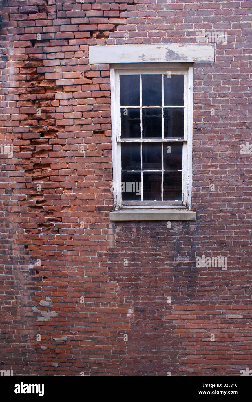 An old window in a decaying brick wall Stock Photo - Alamy