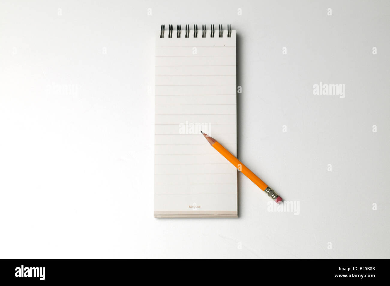 Note and pencil Stock Photo - Alamy