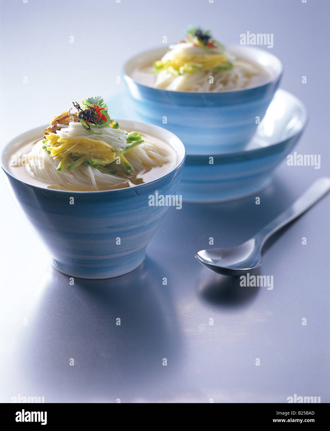 Korean cuisine - noddles and spoon Stock Photo - Alamy
