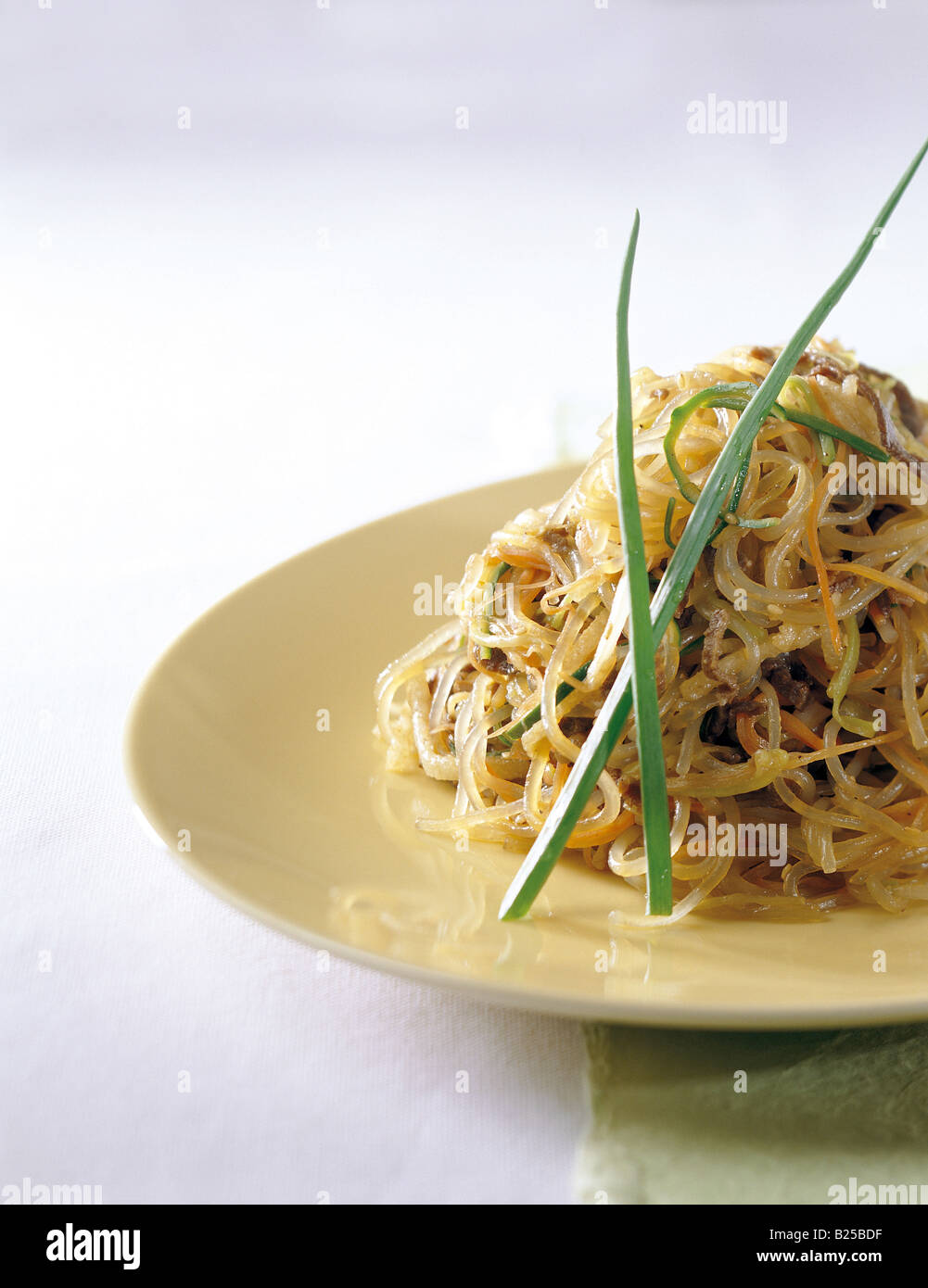 Korean cuisine - noddles and chopsticks Stock Photo - Alamy